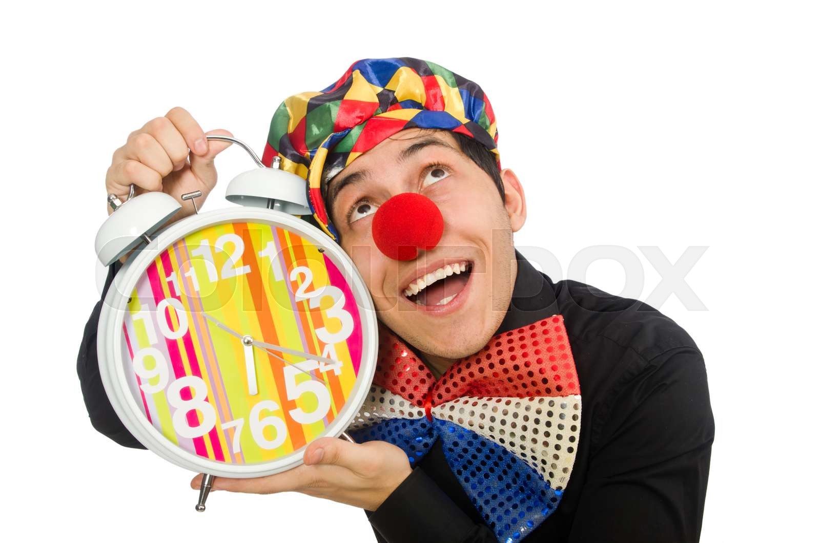 Funny clown with clock isolated on white | Stock image | Colourbox