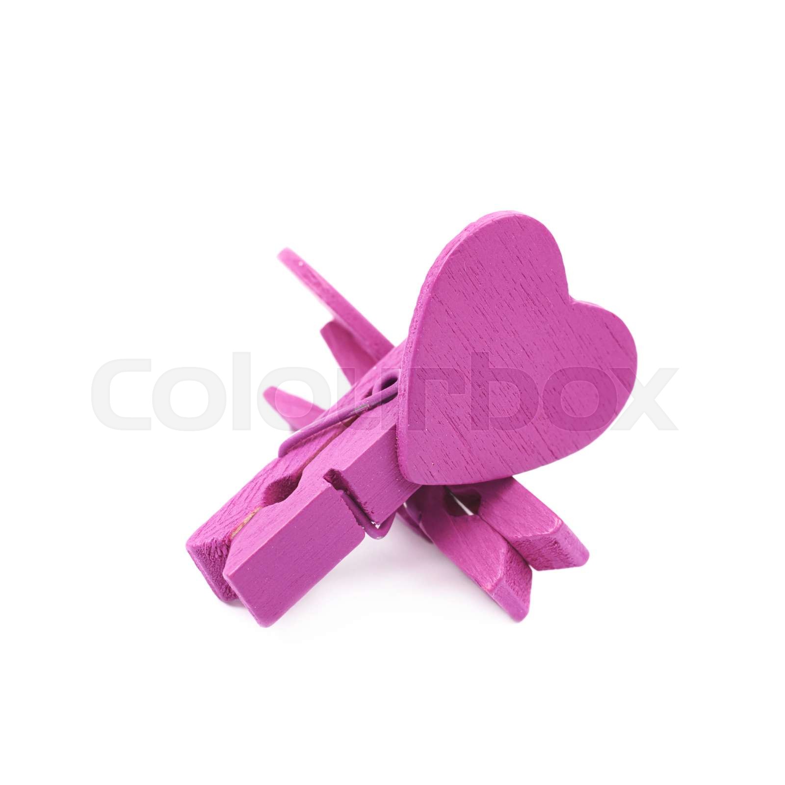 Heart shaped wooden peg isolated | Stock image | Colourbox