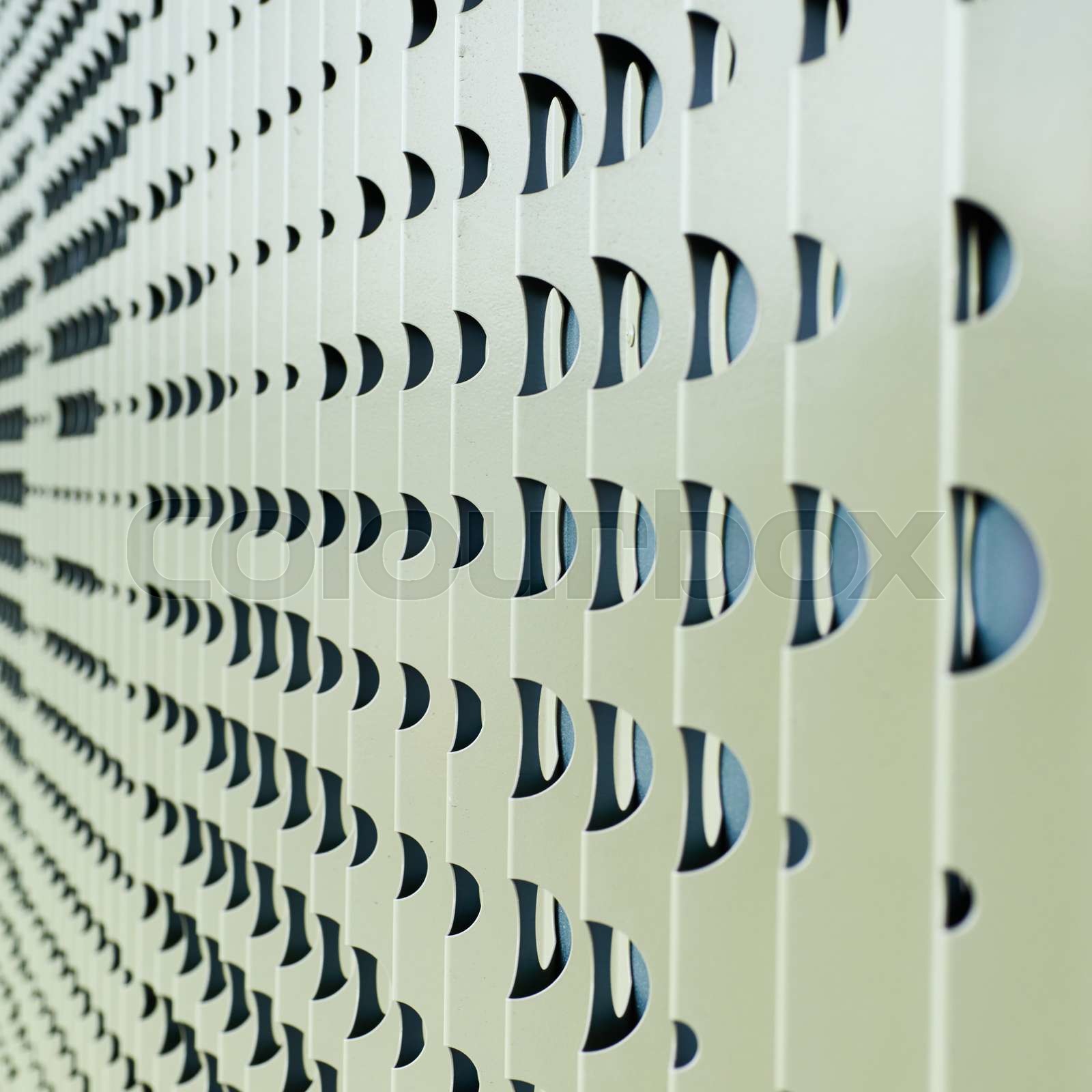 Wall protector made of perforated metal | Stock image | Colourbox
