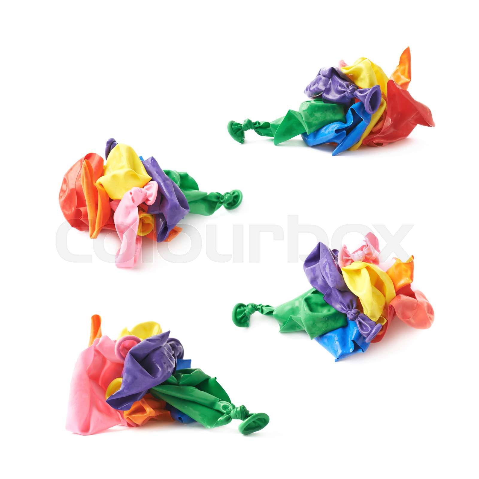 Pile of burst air balloons isolated | Stock image | Colourbox