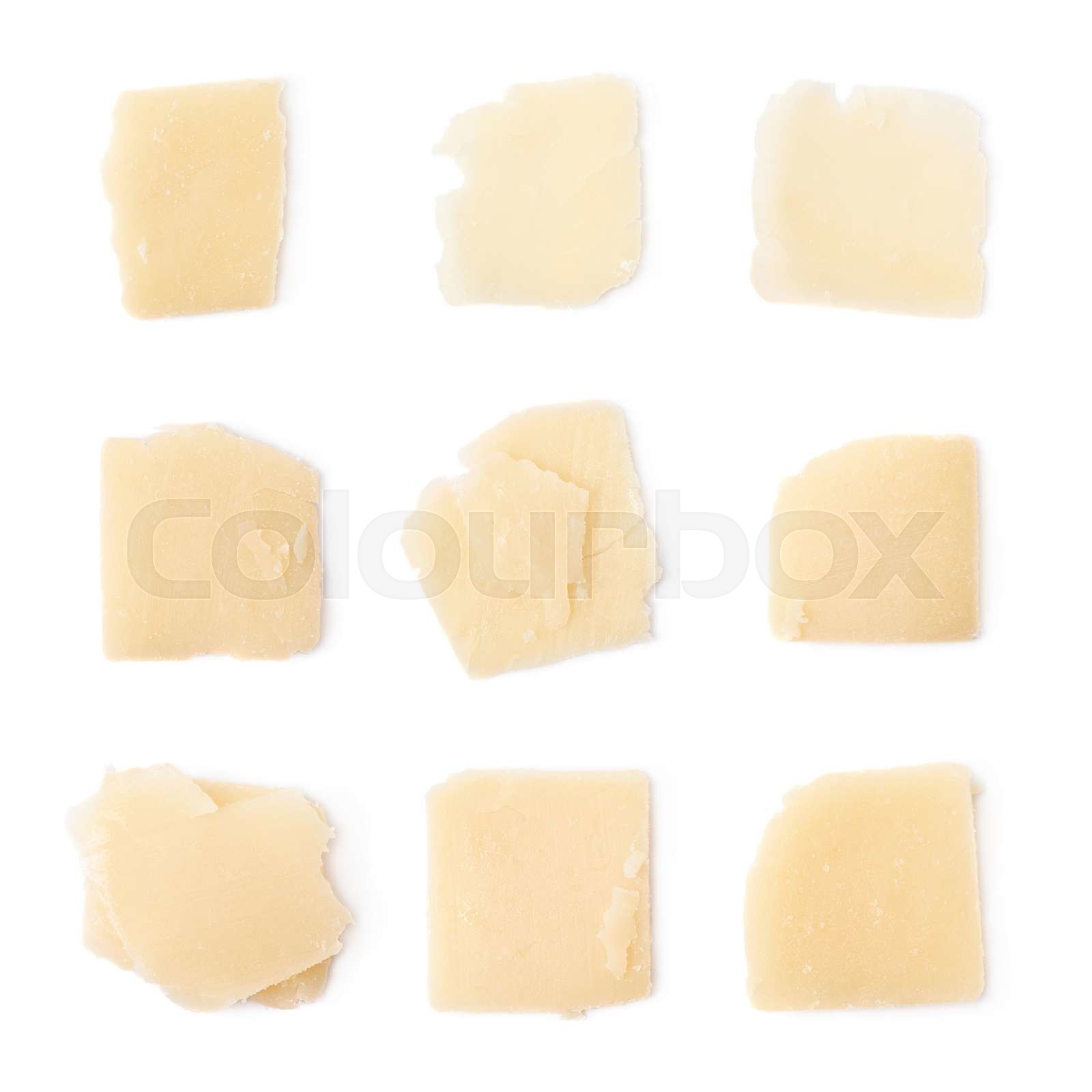 Parmesan cheese flakes isolated | Stock image | Colourbox