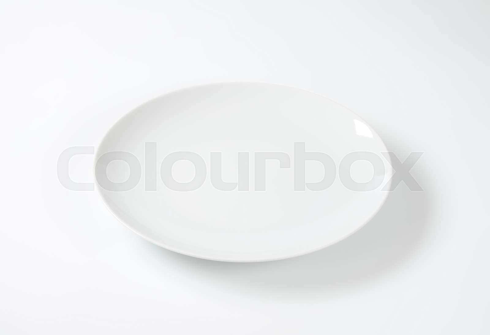 Round white plate | Stock image | Colourbox