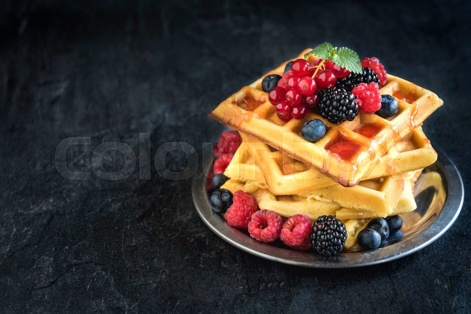 Traditional Belgian waffles with berry fruit | Stock image | Colourbox