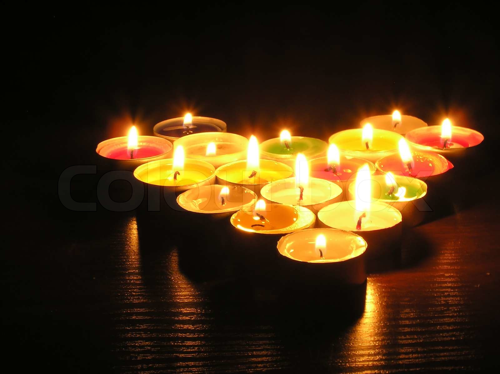 Candles at the form of a triangle | Stock image | Colourbox