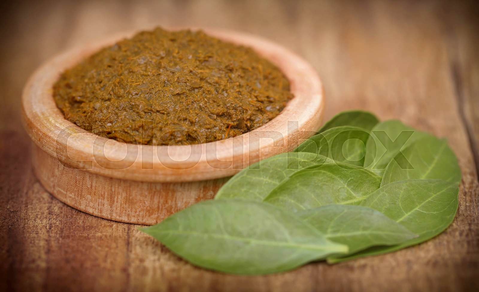 Ayurvedic henna leaves with paste | Stock image | Colourbox