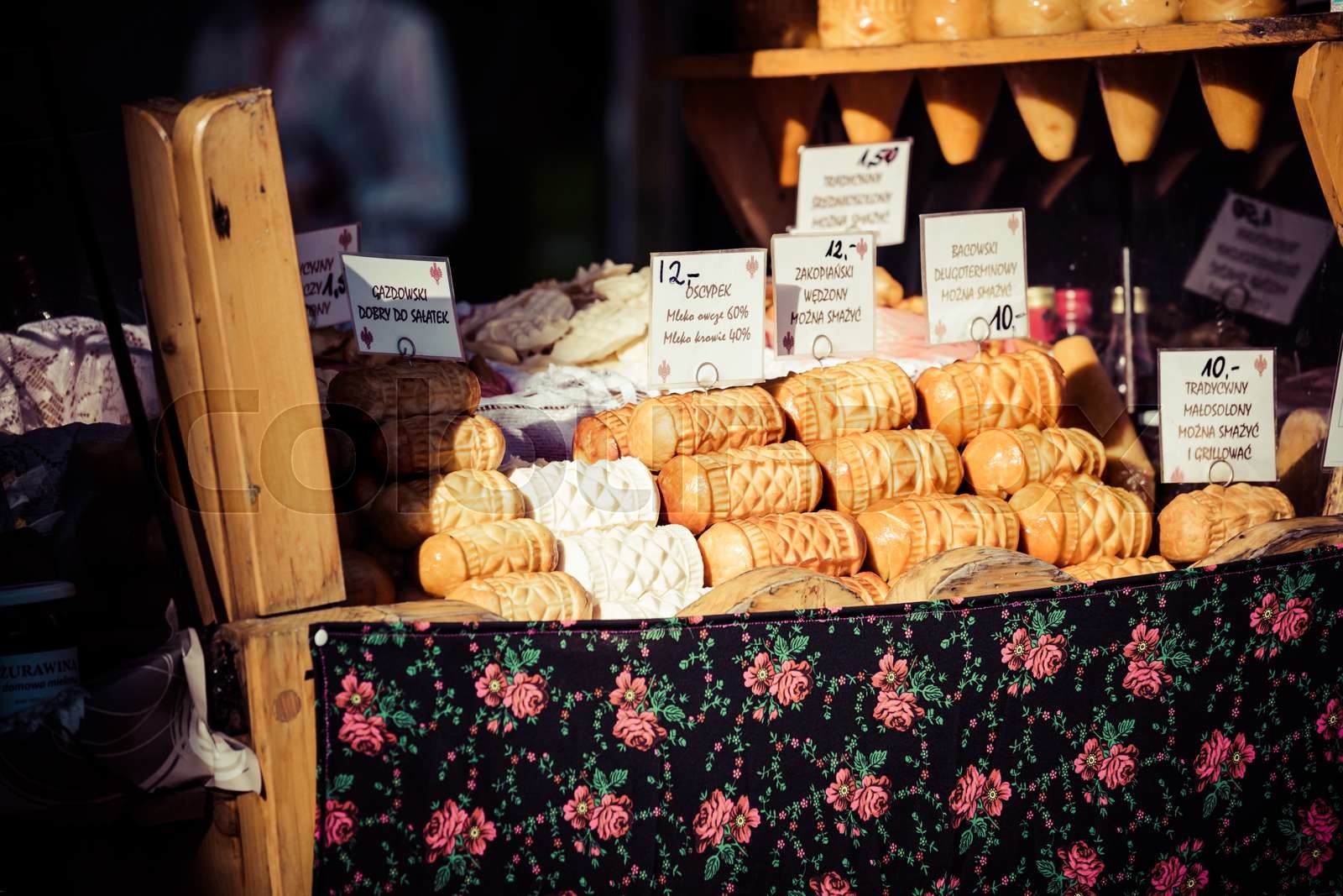 Traditional polish smoked cheese oscypek on outdoor market in Zakopane ...