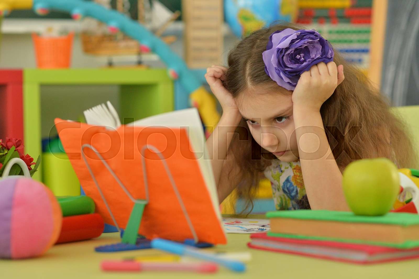 Cute student girl at class | Stock image | Colourbox