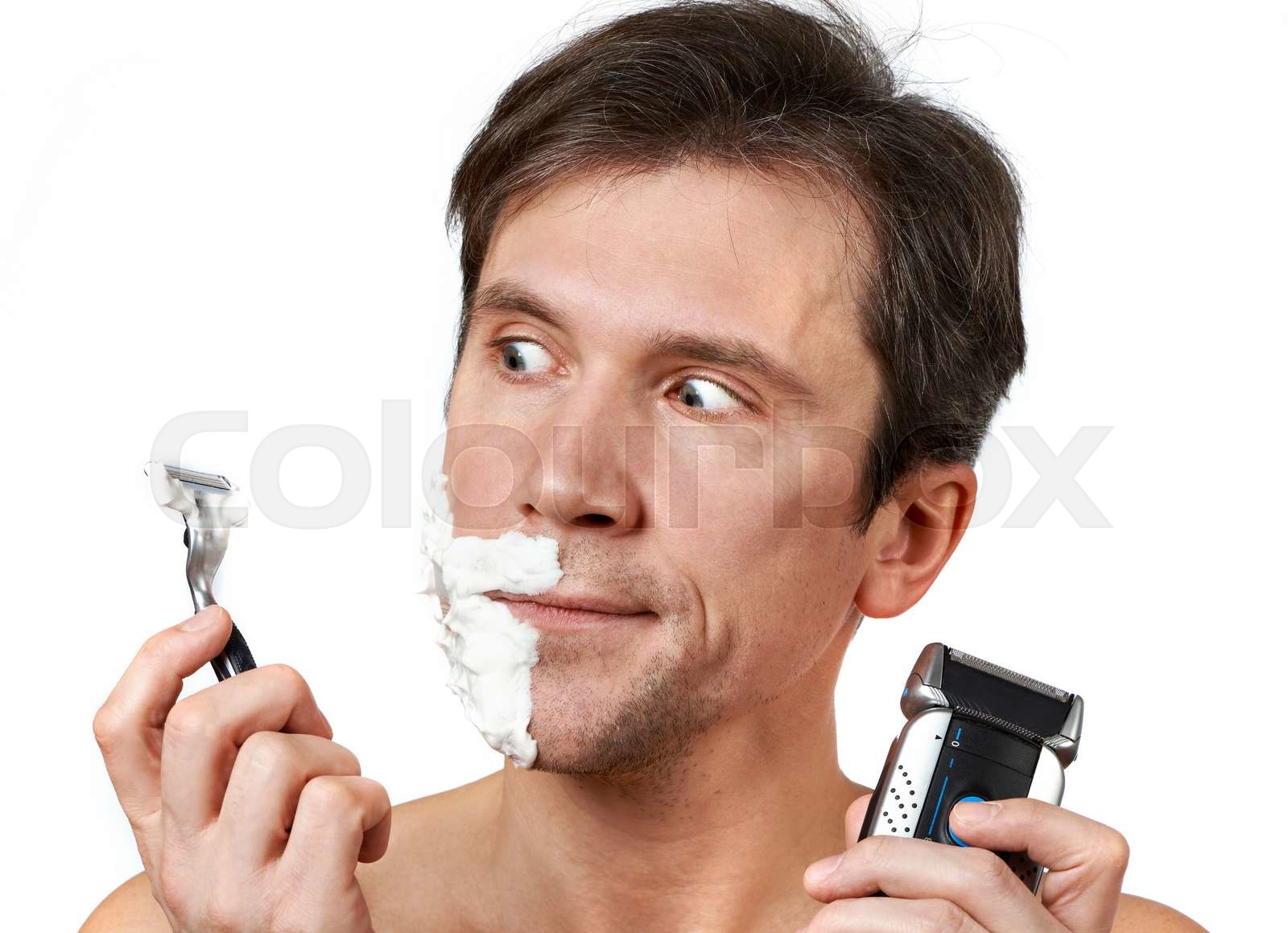 Man chooses razors | Stock image | Colourbox