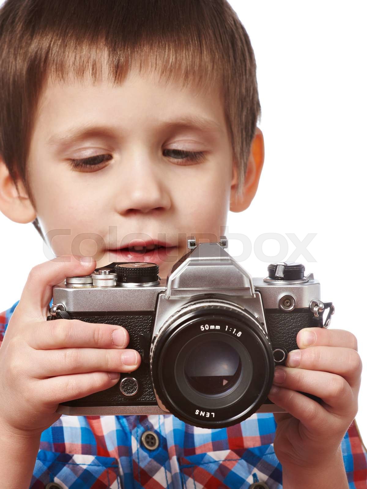 Little boy reporter photographer with SLR camera isolated | Stock image ...