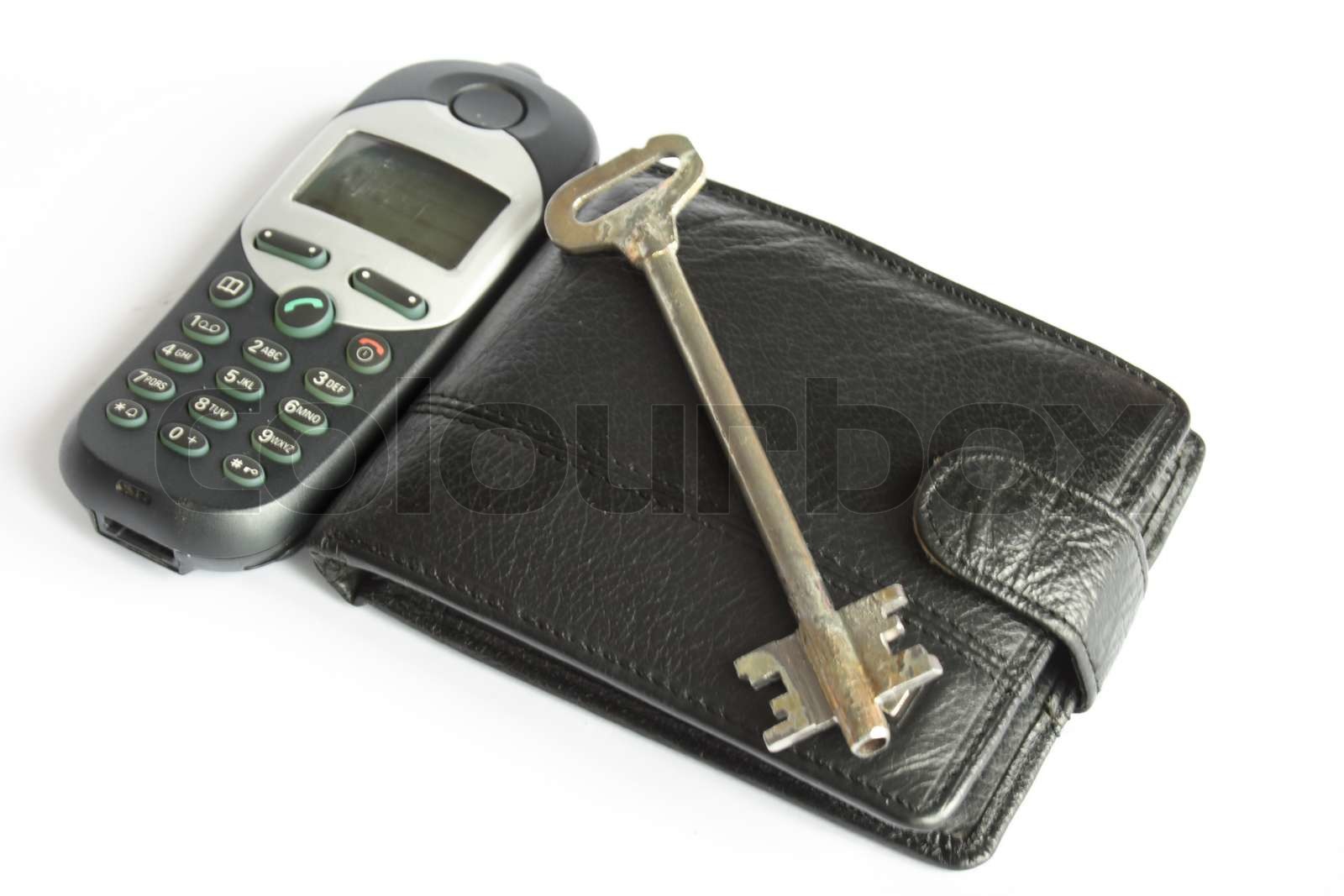 Black purse and key and mobile phone | Stock image | Colourbox