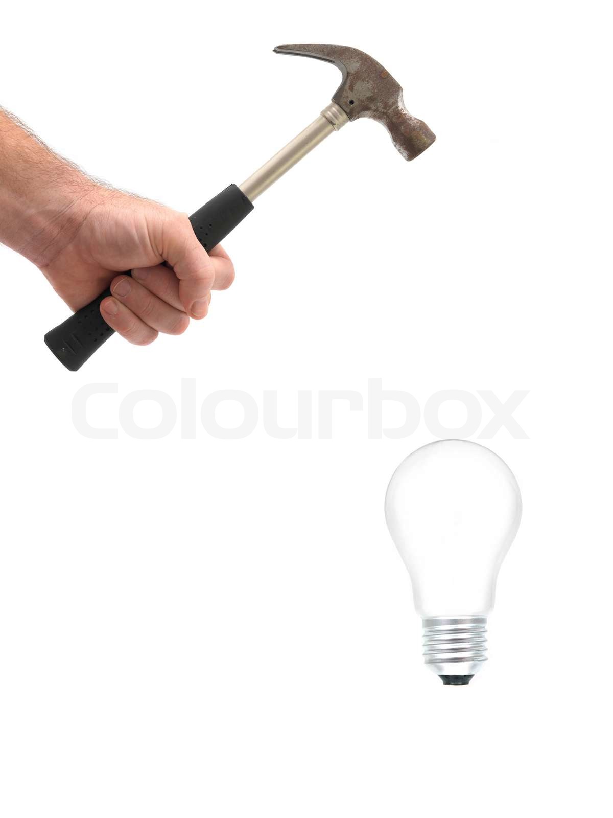 A light bulb being smashed with a hammer | Stock image | Colourbox