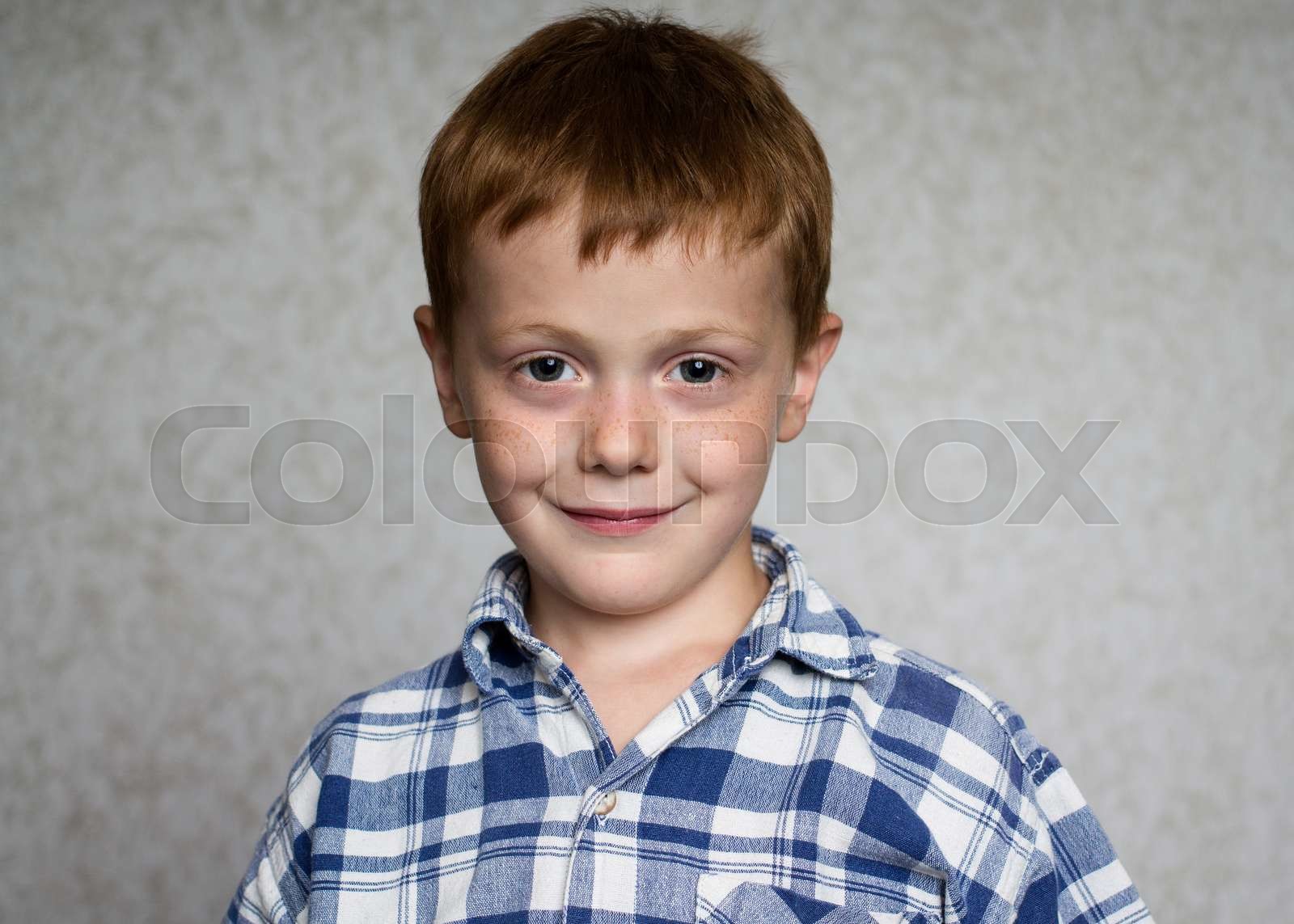 portrait of a ginger smiling boy with freckles | Stock image | Colourbox