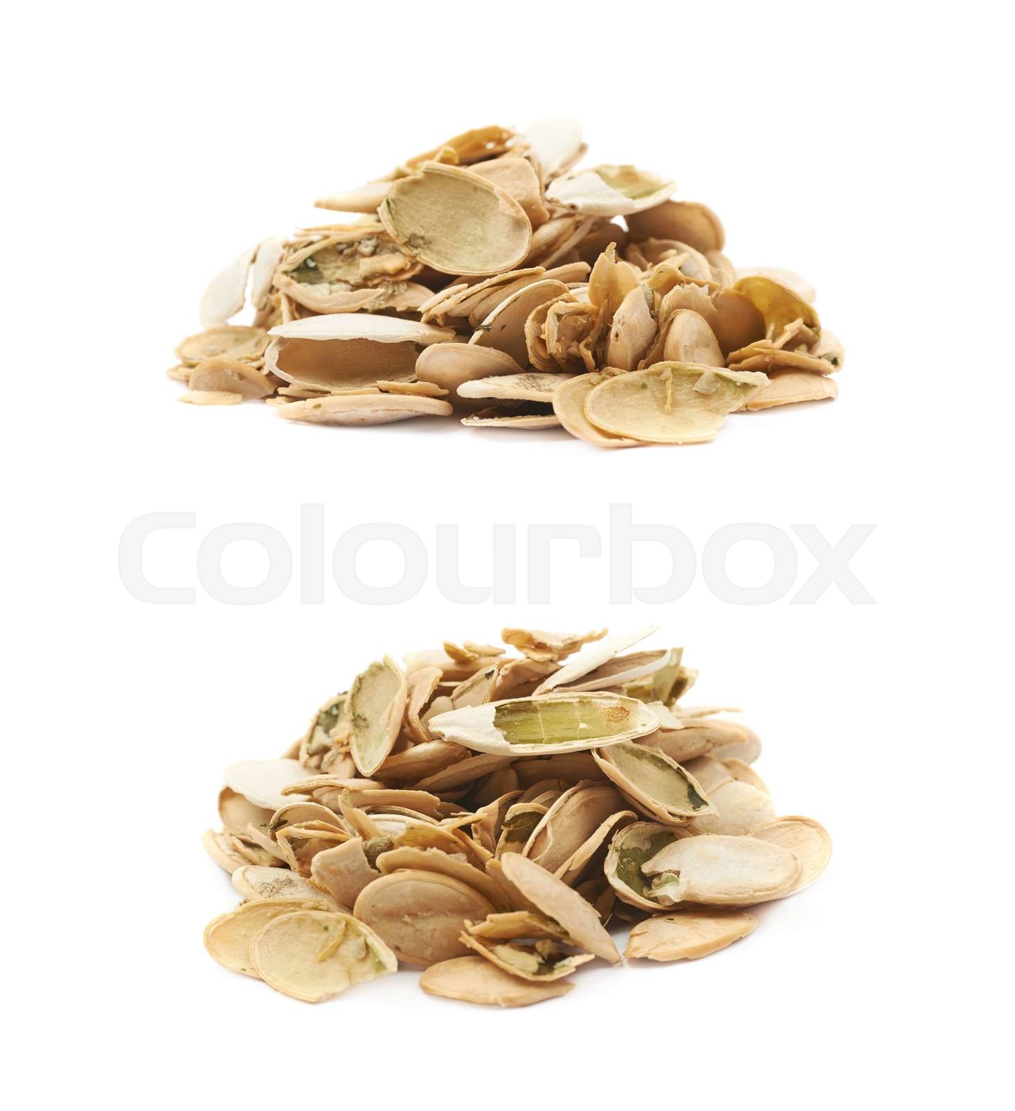 Pile of pumpkin seeds shells isolated | Stock image | Colourbox