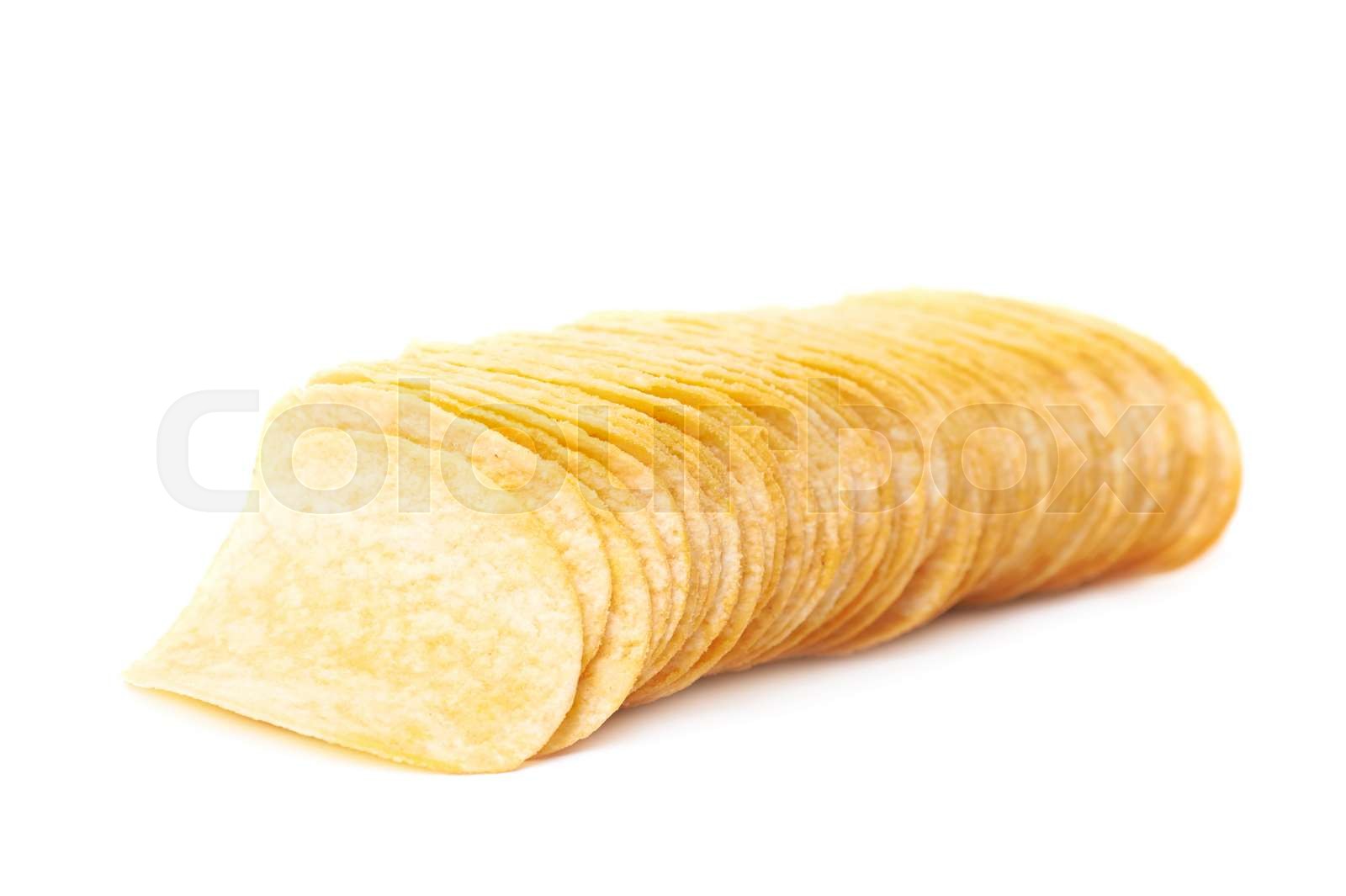 Stack of multiple potato chips isolated | Stock image | Colourbox