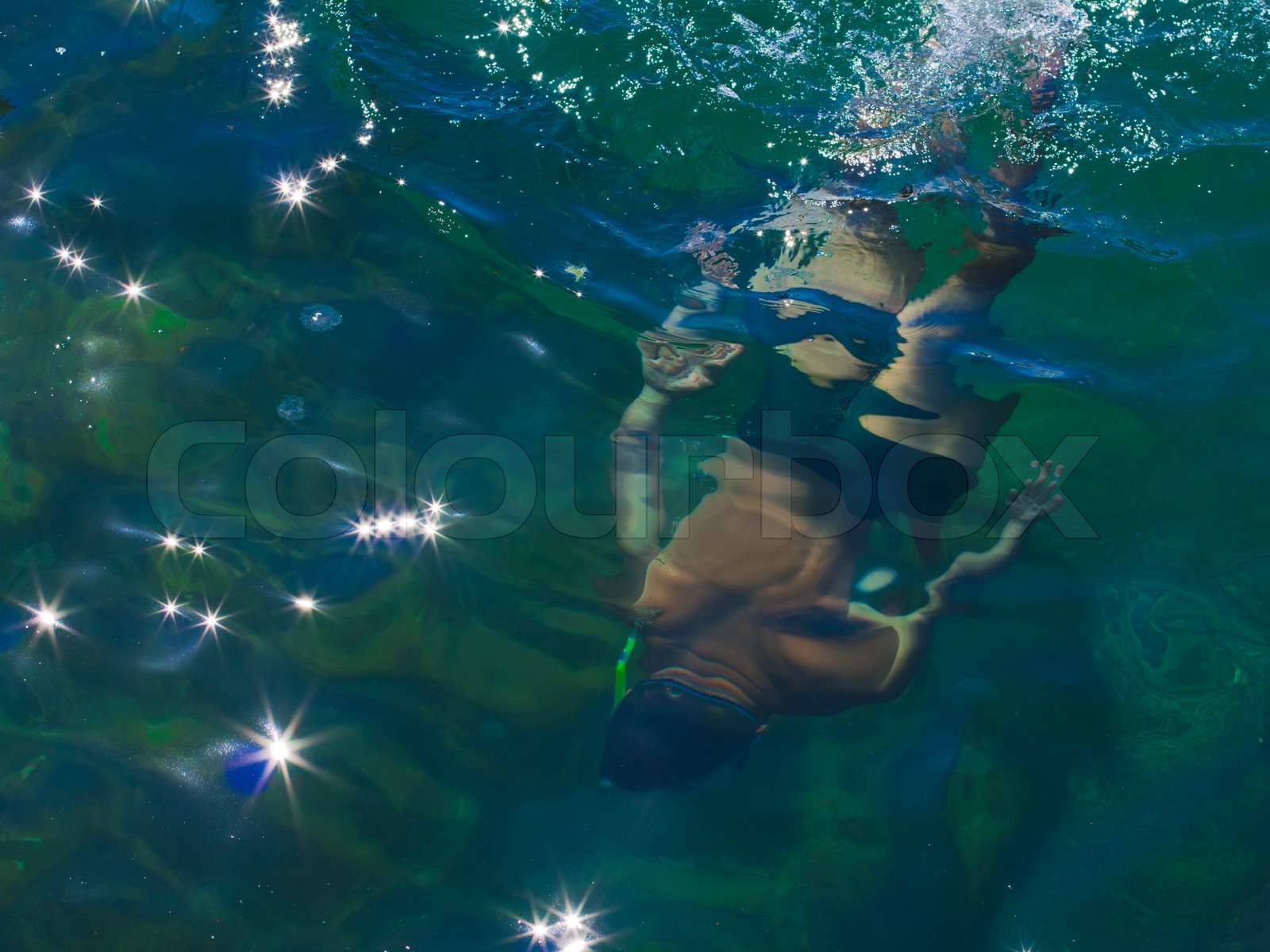 swimmer dived into the sea water | Stock image | Colourbox