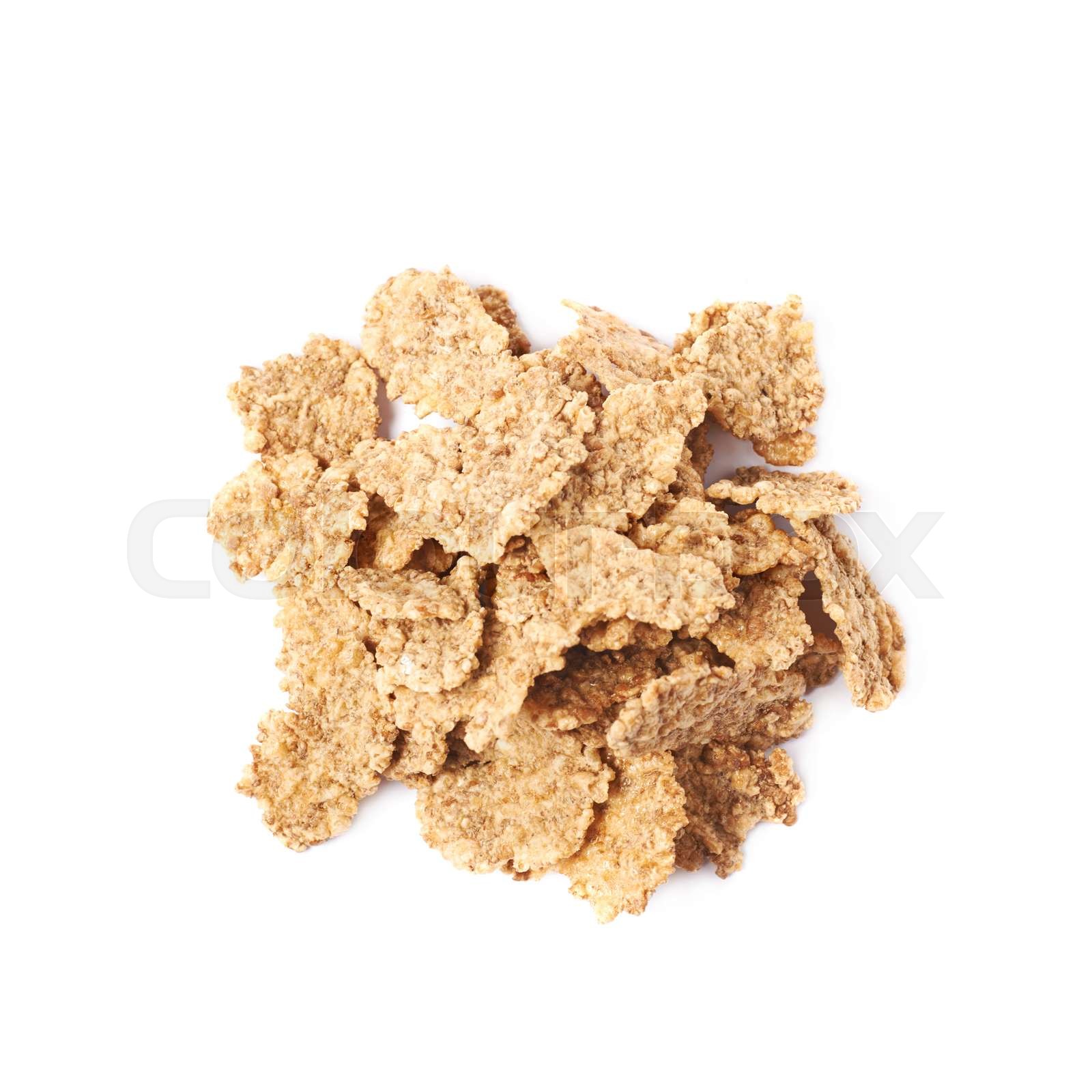 Pile of wholegrain cereal flakes isolated | Stock image | Colourbox