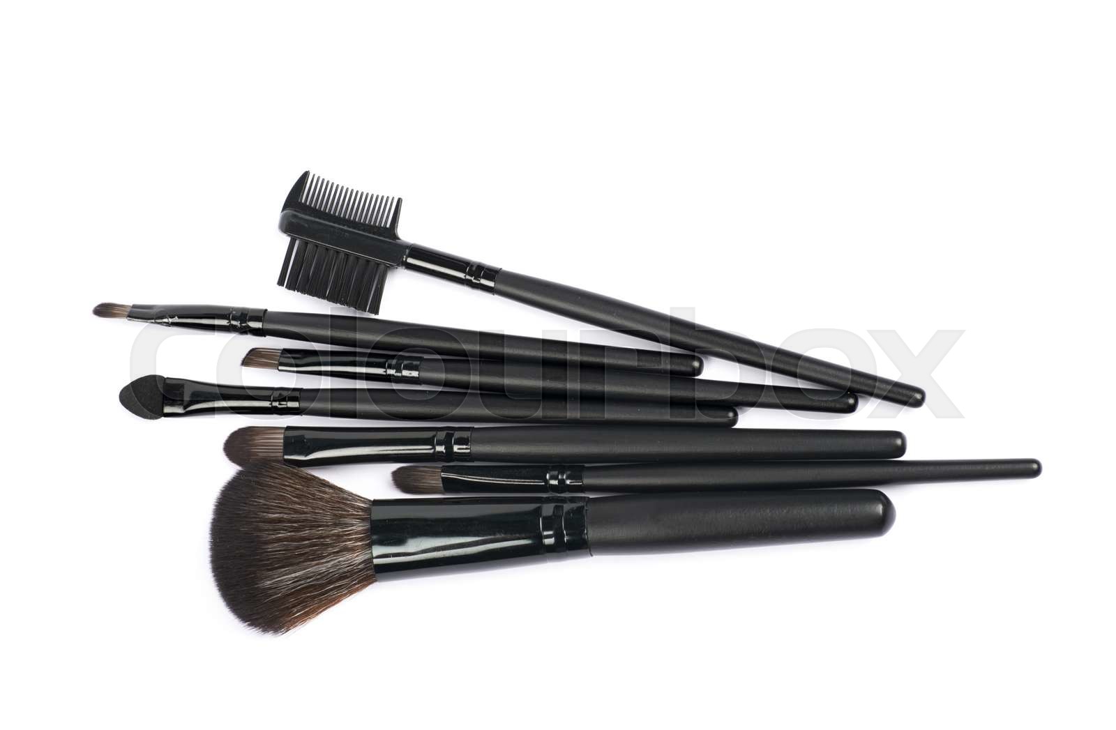 Pile of makeup tools and brushed isolated | Stock image | Colourbox