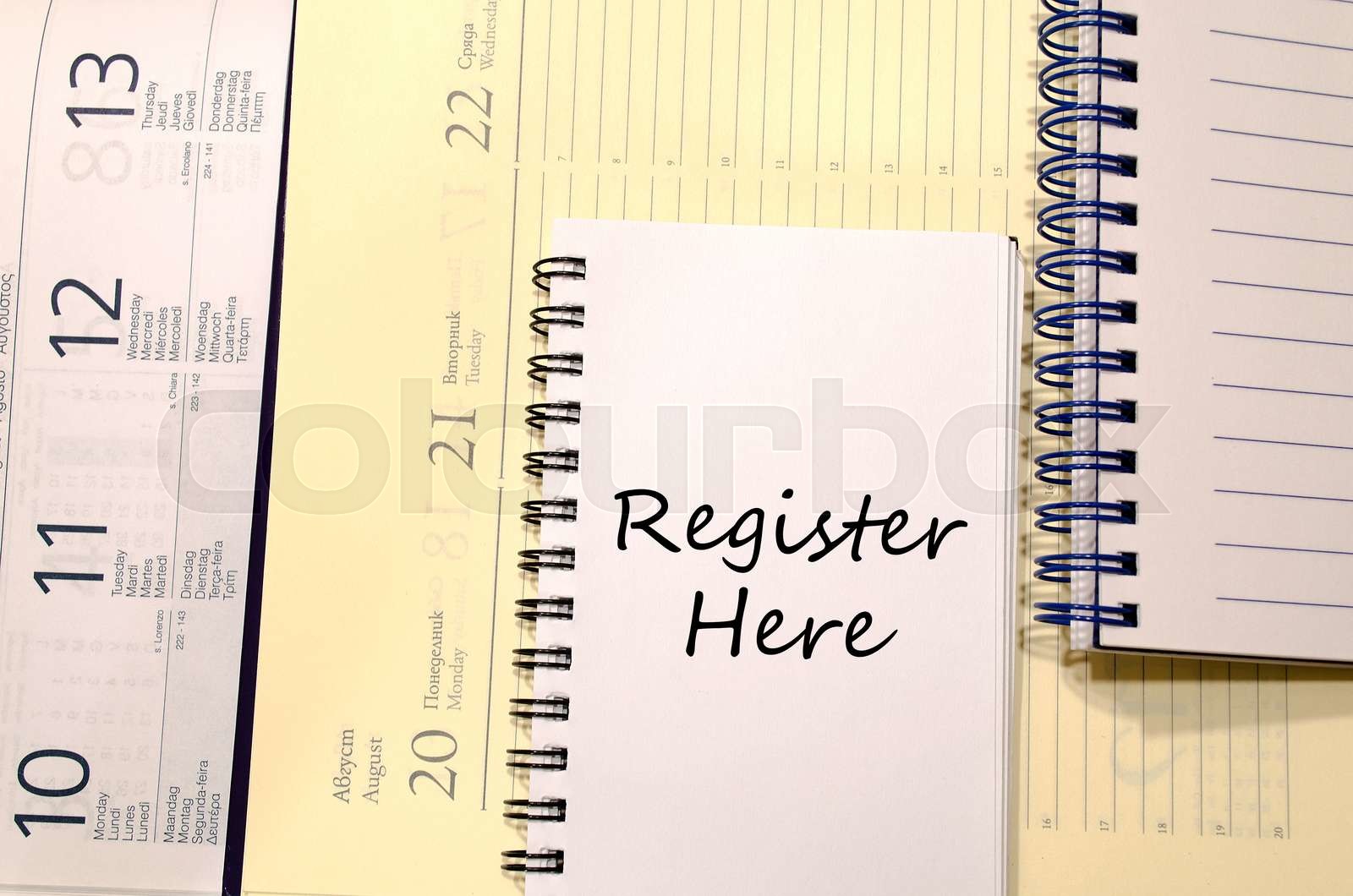 Register here write on notebook | Stock image | Colourbox