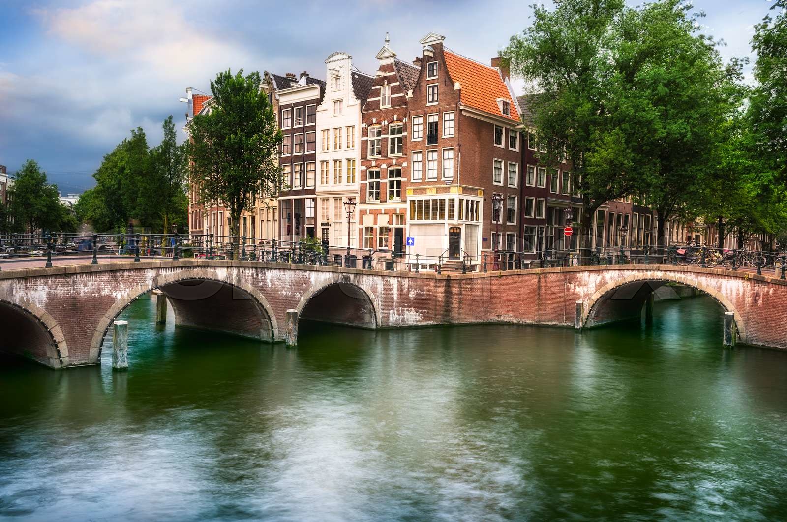 Bridge and houses in Amsterdam | Stock image | Colourbox