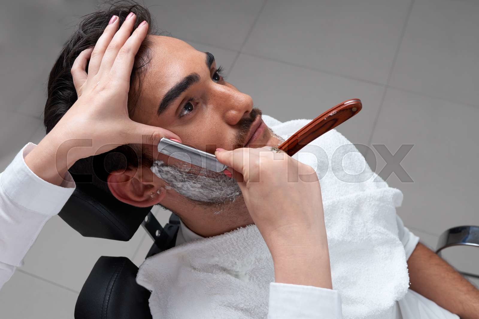 shaving process Barbershop face closeup | Stock image | Colourbox