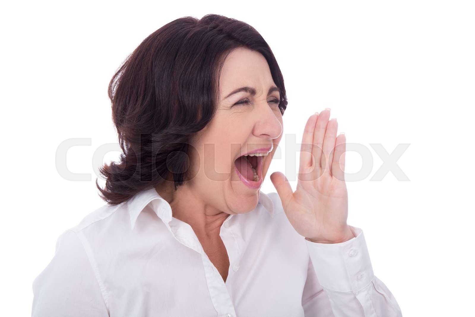 mature woman shouting isolated on white | Stock image | Colourbox