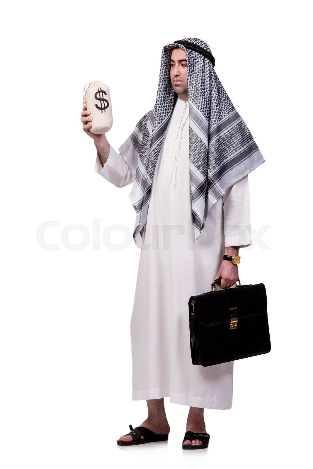 Arab man with money sacks isolated on white | Stock image | Colourbox