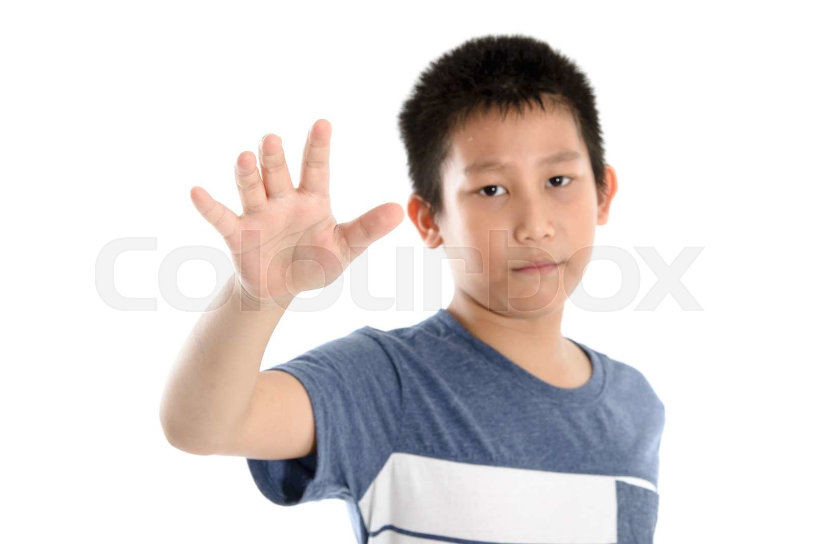 Asian child pressing digital buttons on touchscreen, ideal for your ...