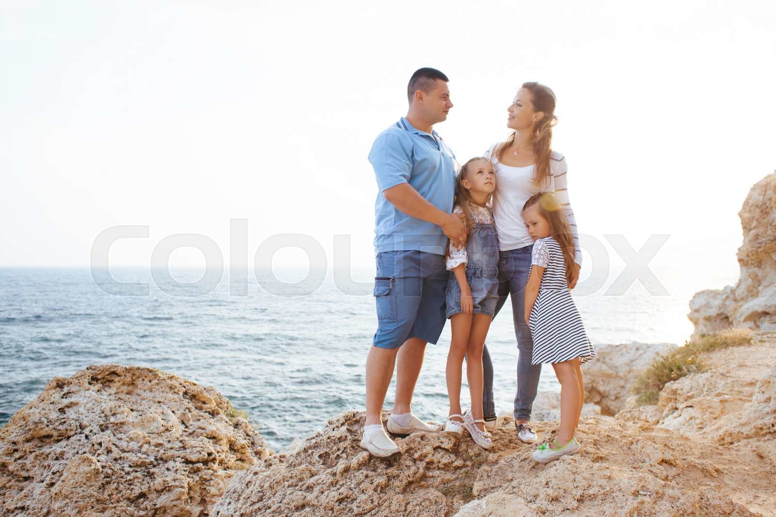 Family on the sea shore | Stock image | Colourbox