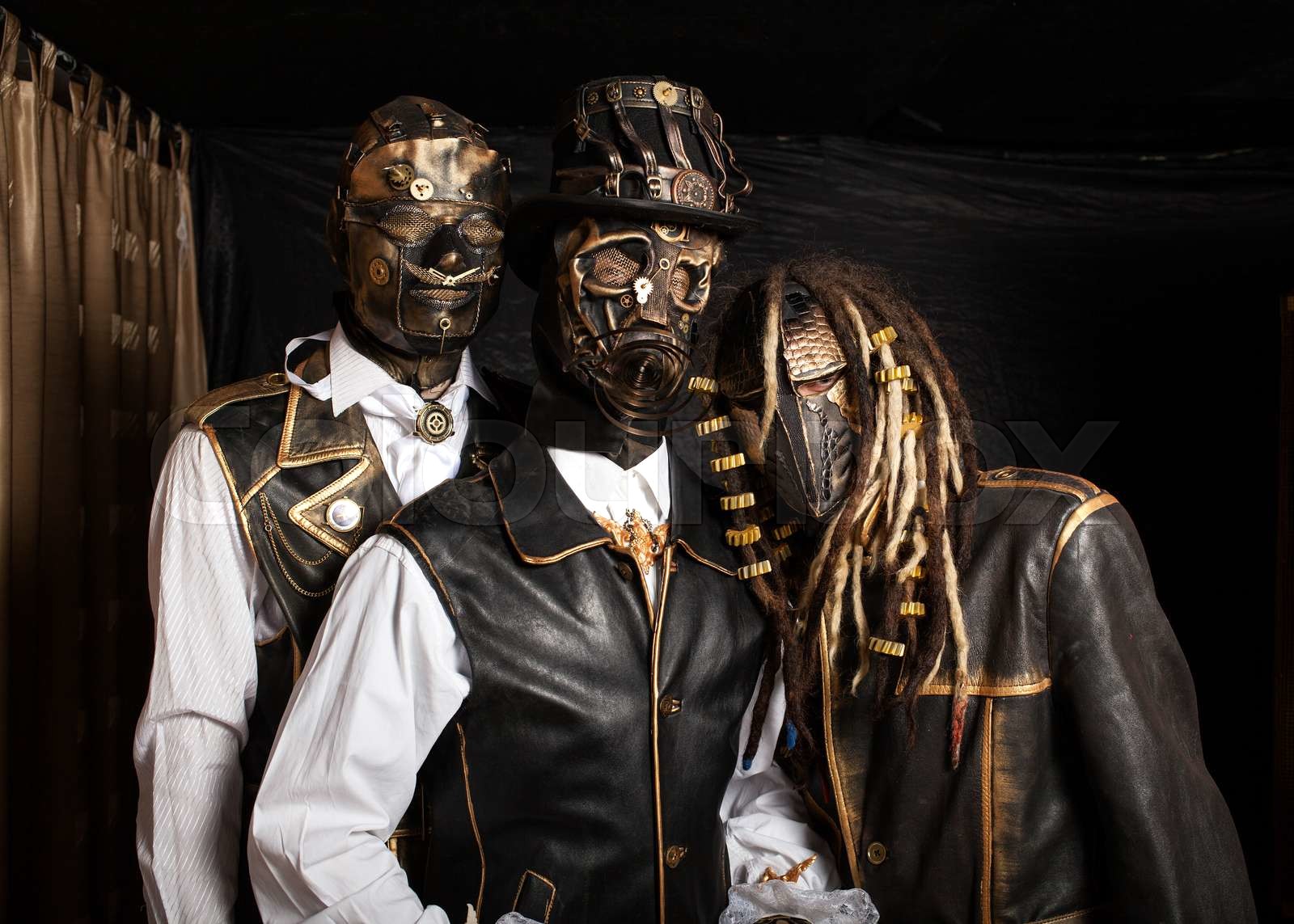 Three actors in cyborg costumes | Stock image | Colourbox