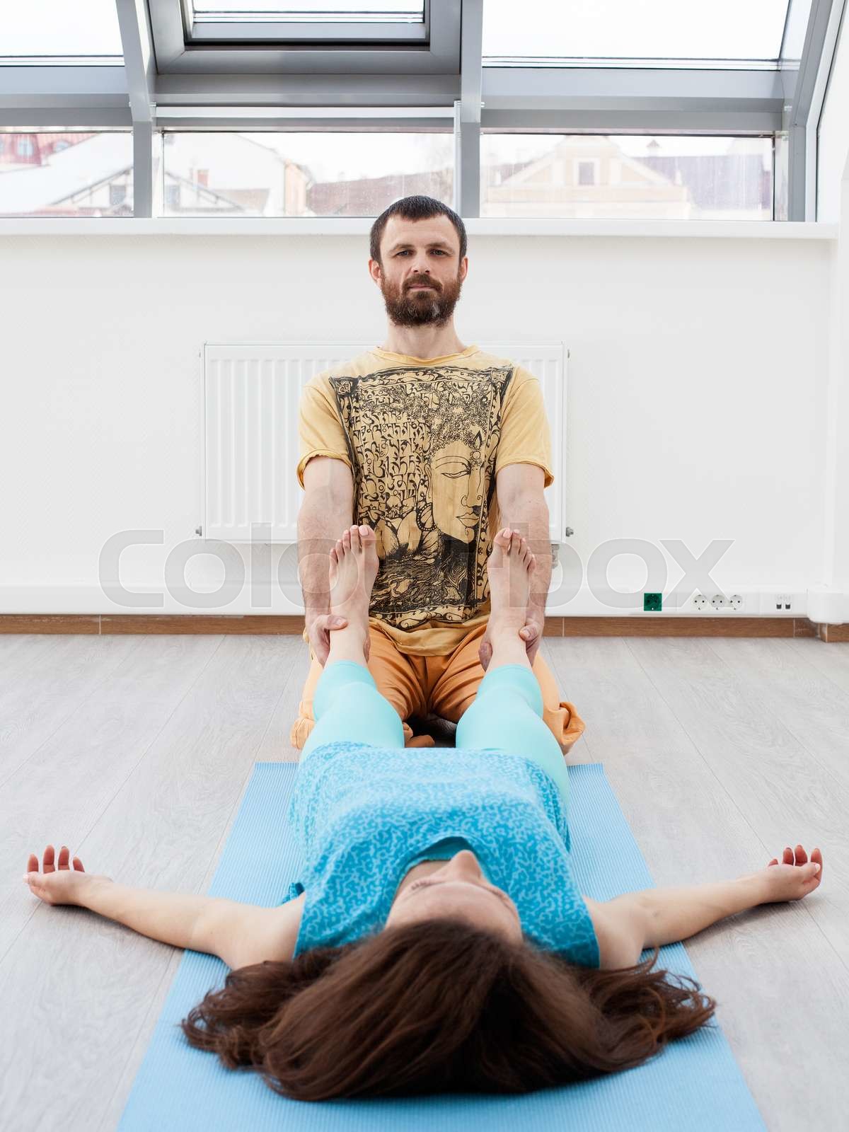 Pair exercises. Stretching | Stock image | Colourbox