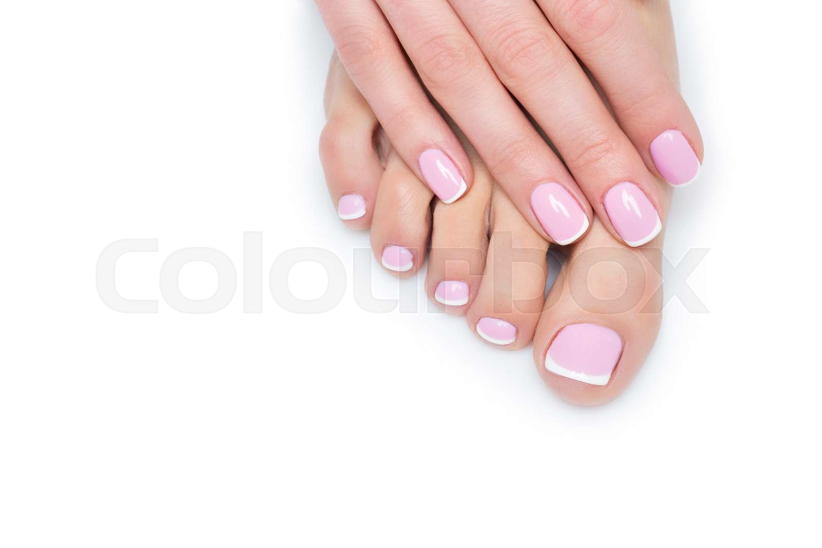 Woman hands and feet with french manicure | Stock image | Colourbox