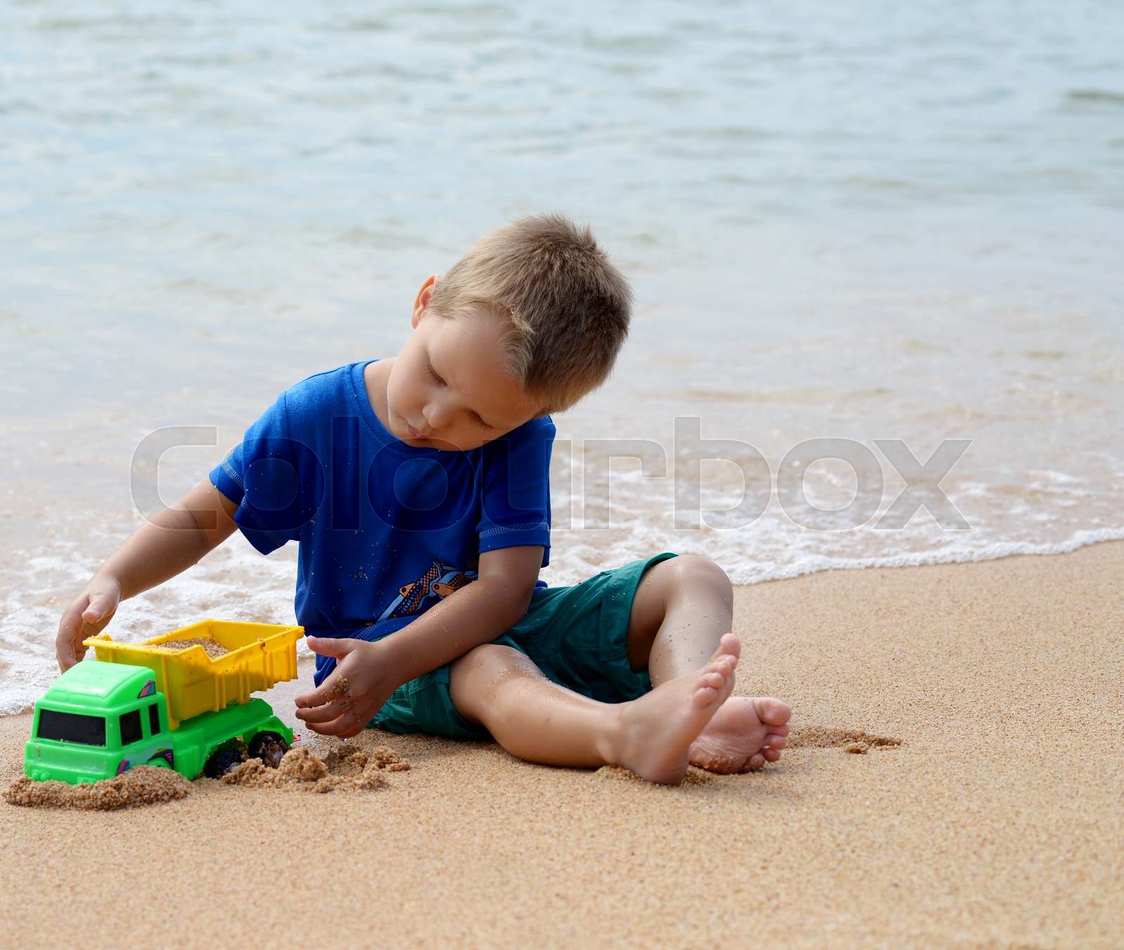 little boy playing with beach | Stock image | Colourbox
