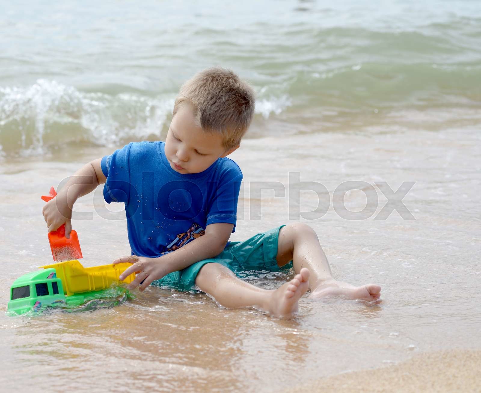 little boy playing with beach | Stock image | Colourbox
