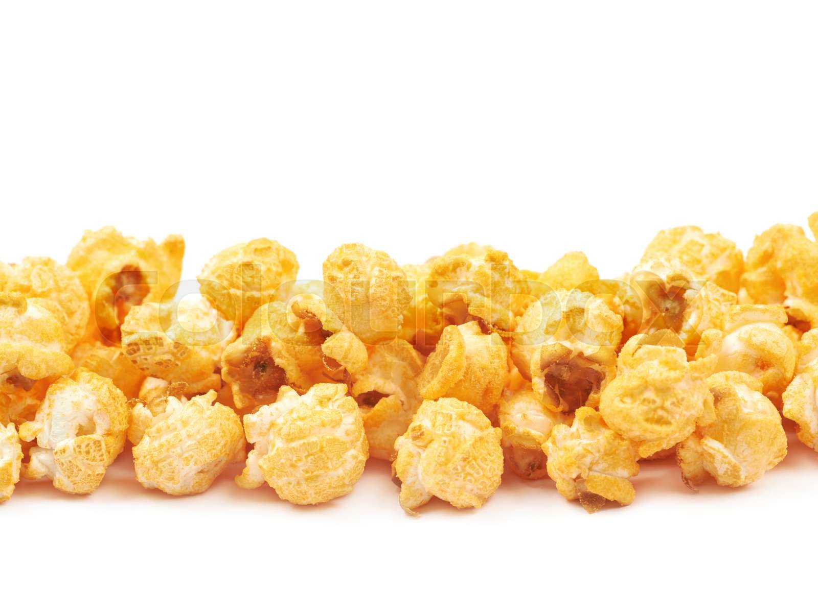 Pile of popcorn flakes isolated | Stock image | Colourbox