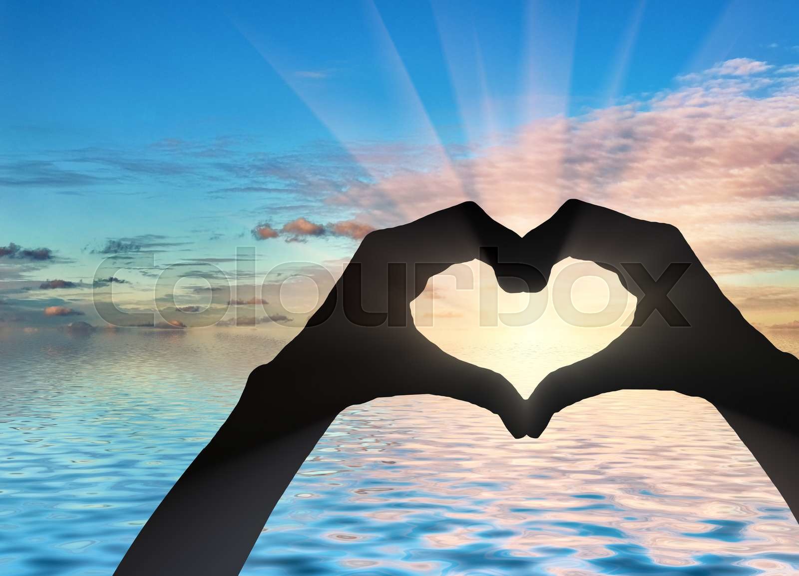 Hands show a gesture of heart | Stock image | Colourbox