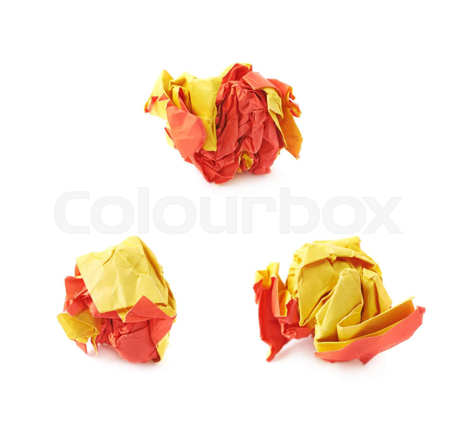 Colorful crumbled paper ball isolated | Stock image | Colourbox