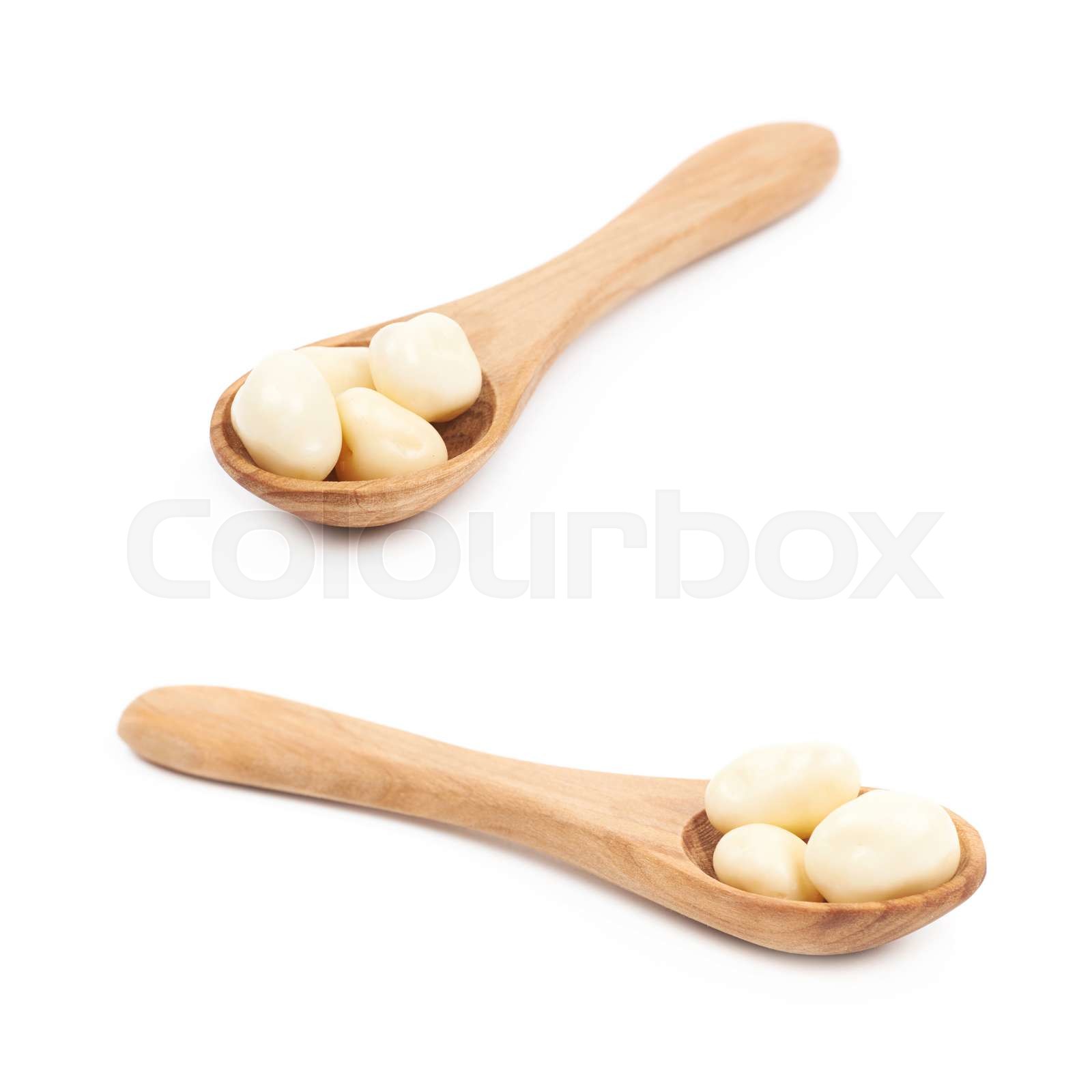 Spoon of chocolate candies isolated | Stock image | Colourbox