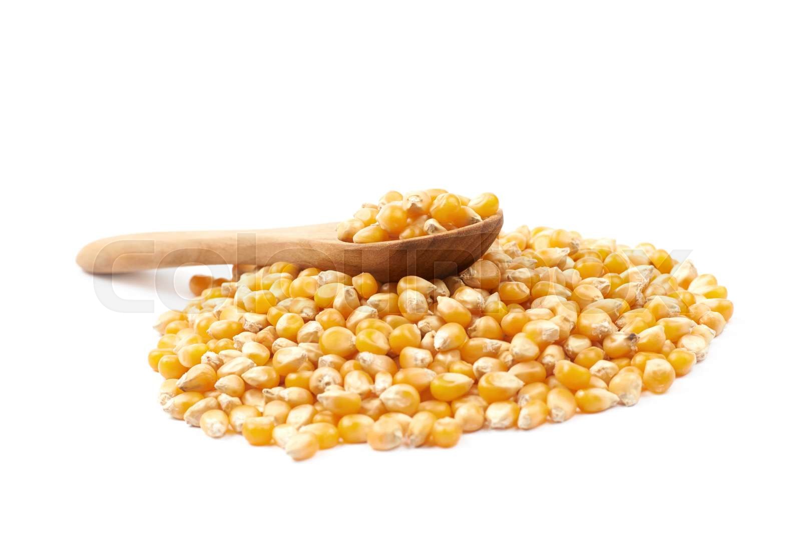 Pile of corn kernels isolated | Stock image | Colourbox