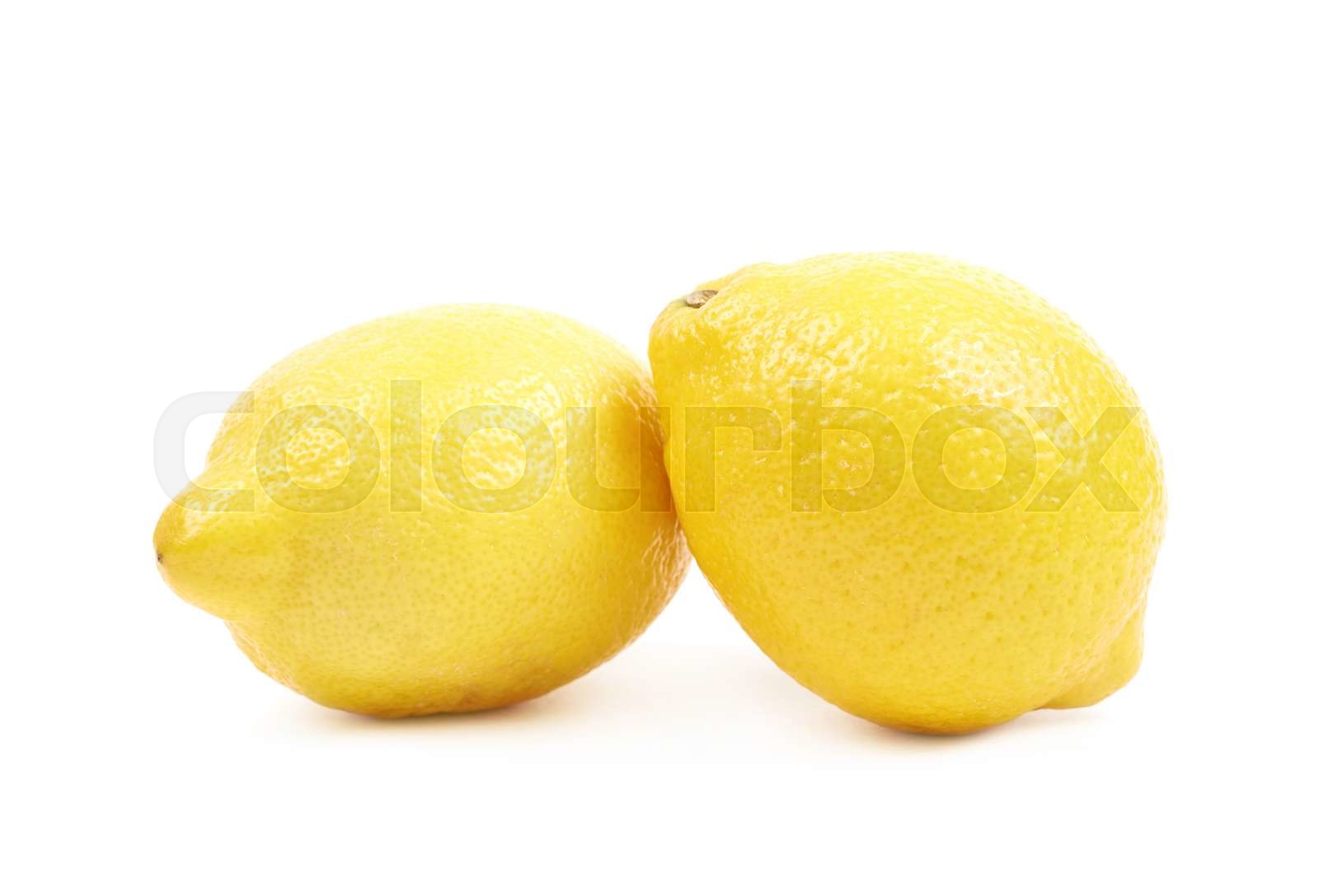 Two lemon fruits isolated | Stock image | Colourbox