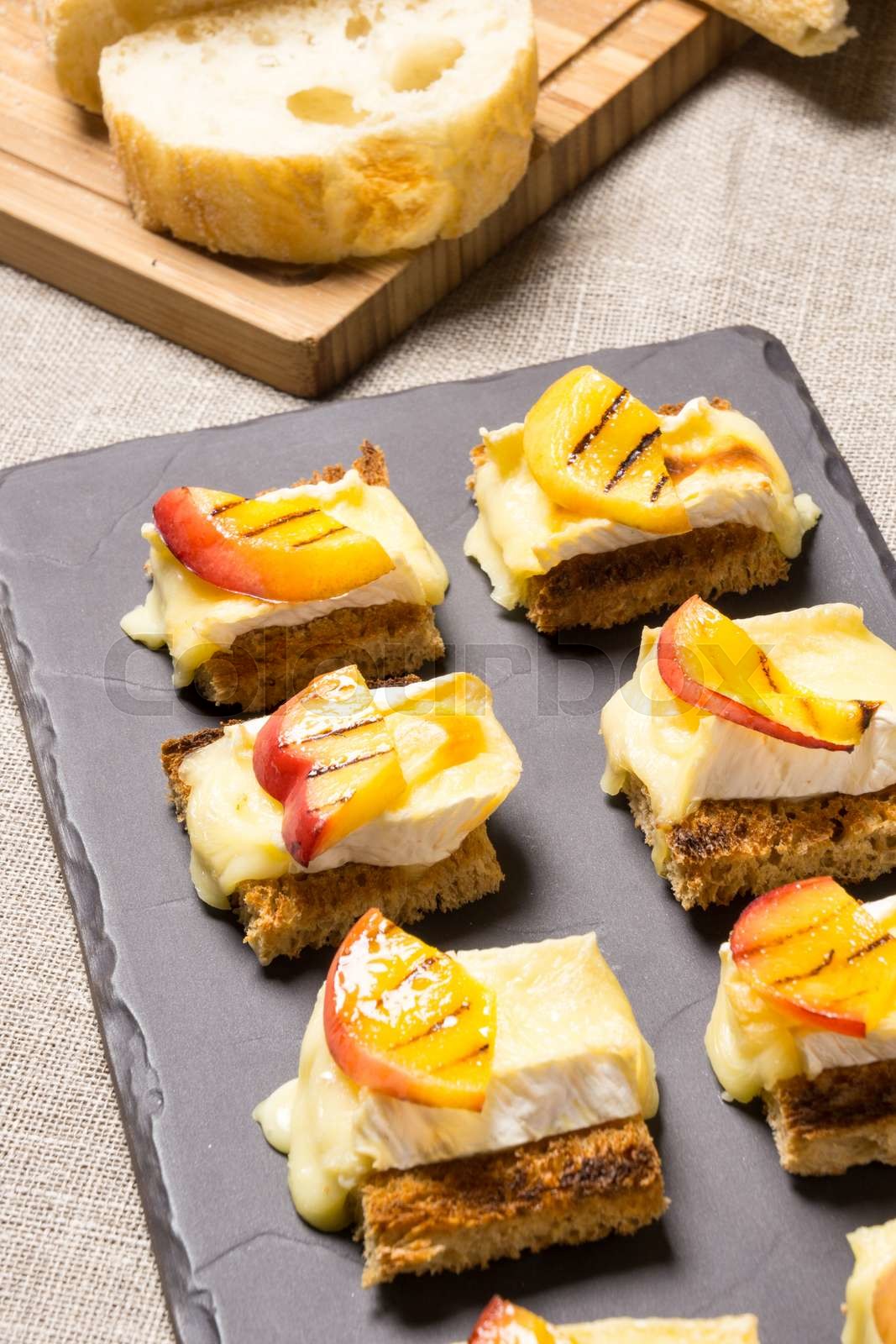 canapes with grilled brie and nectarine | Stock image | Colourbox