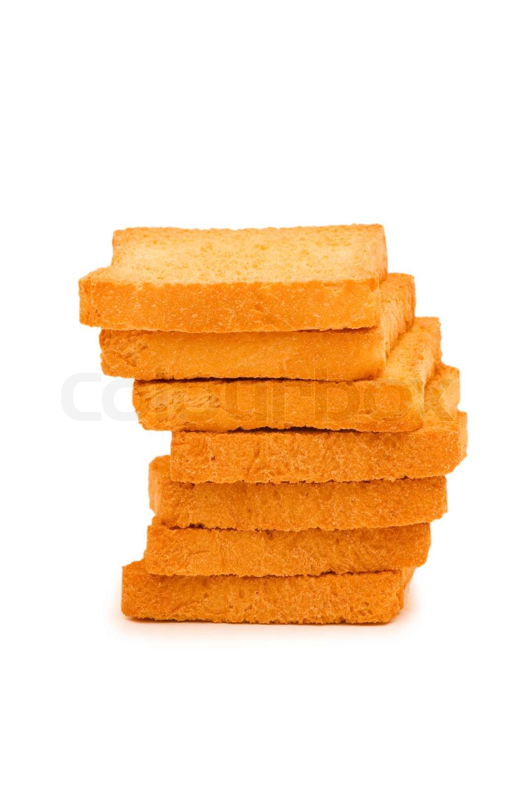 Stack of fresh toasts isolated on white | Stock image | Colourbox