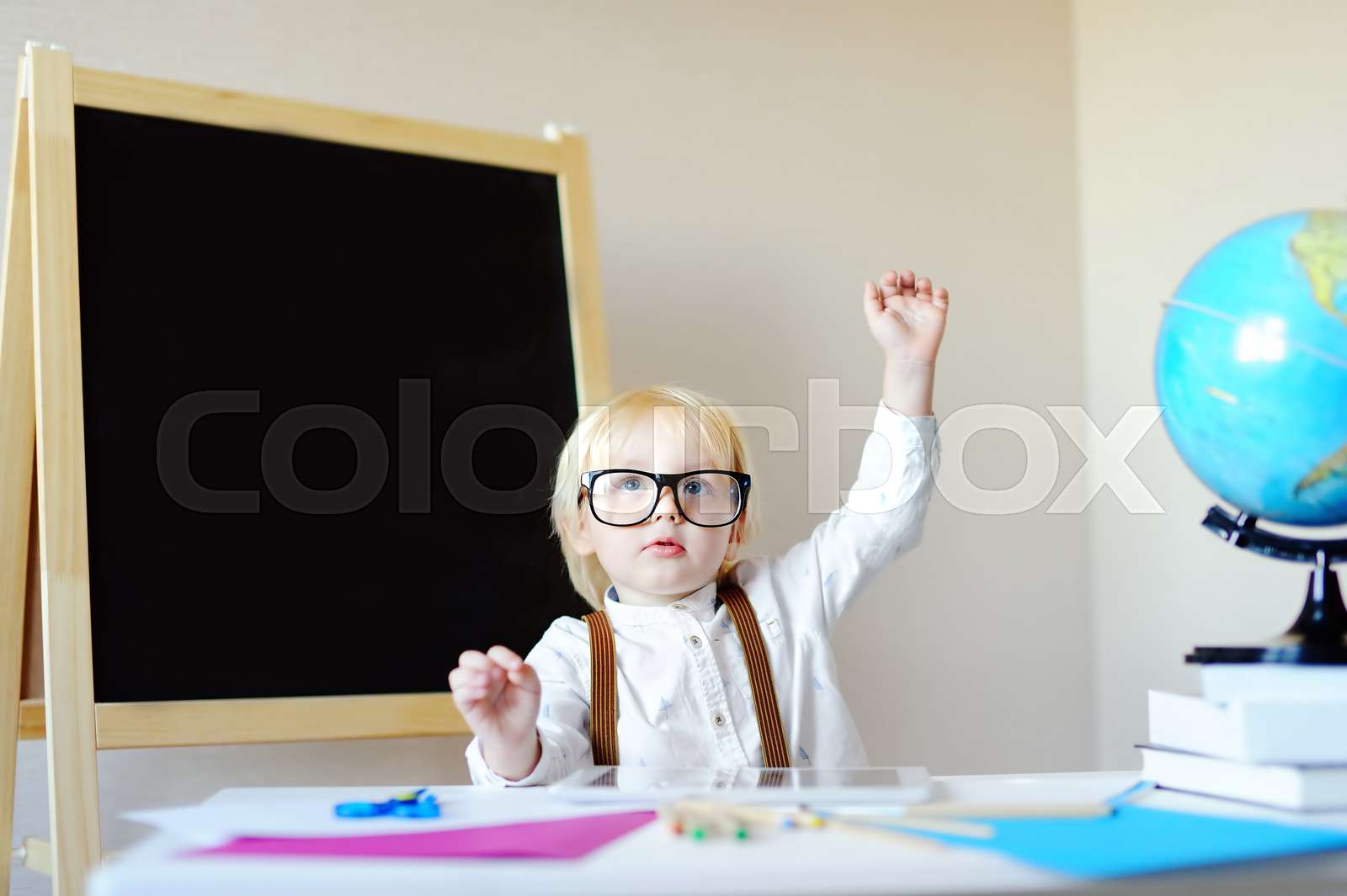 Portrait of little boy at workplace | Stock image | Colourbox
