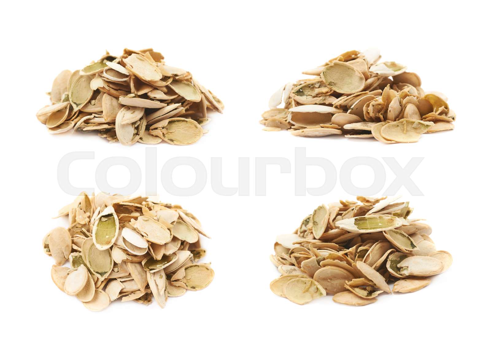 Pile of pumpkin seeds shells isolated | Stock image | Colourbox