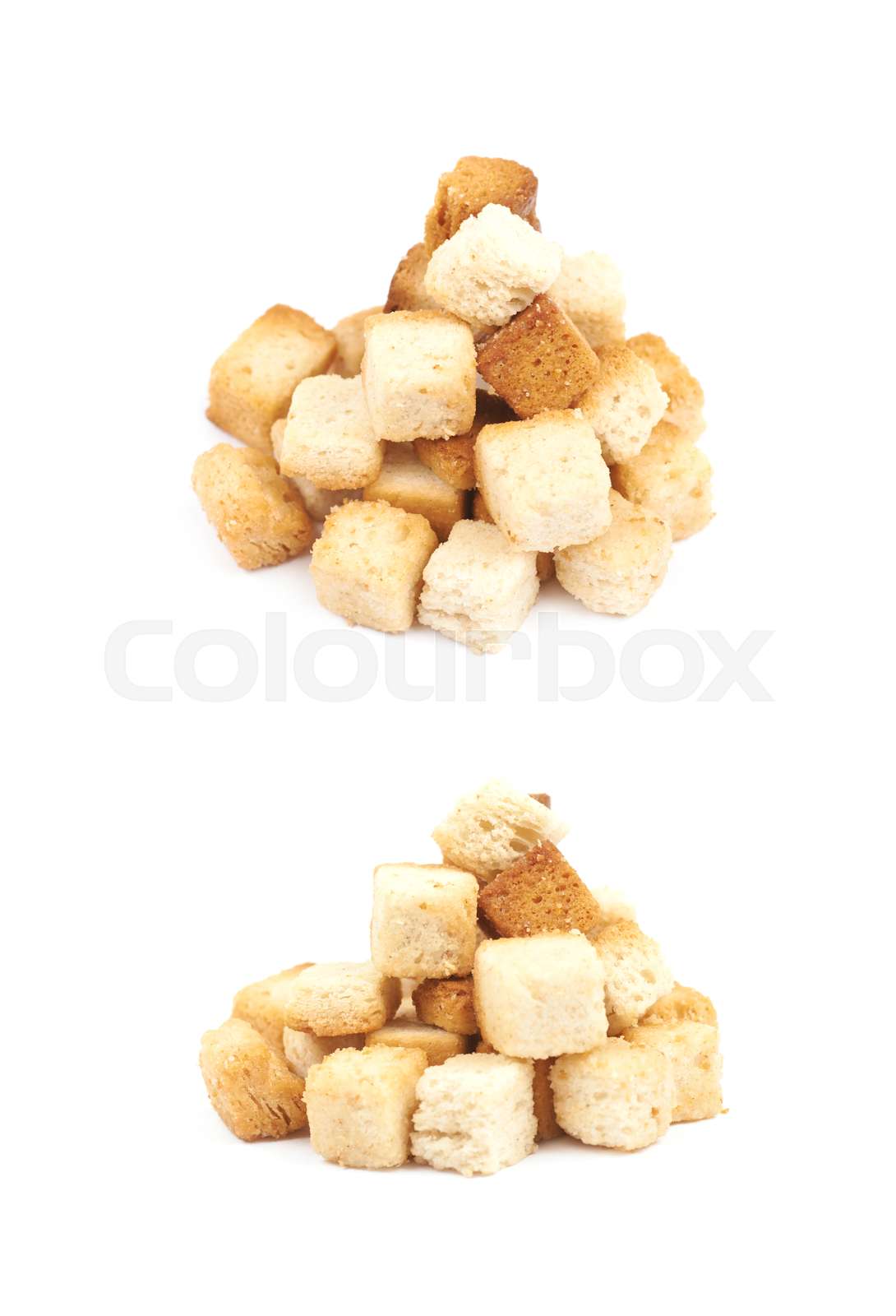 Pile of garlic croutons isolated | Stock image | Colourbox