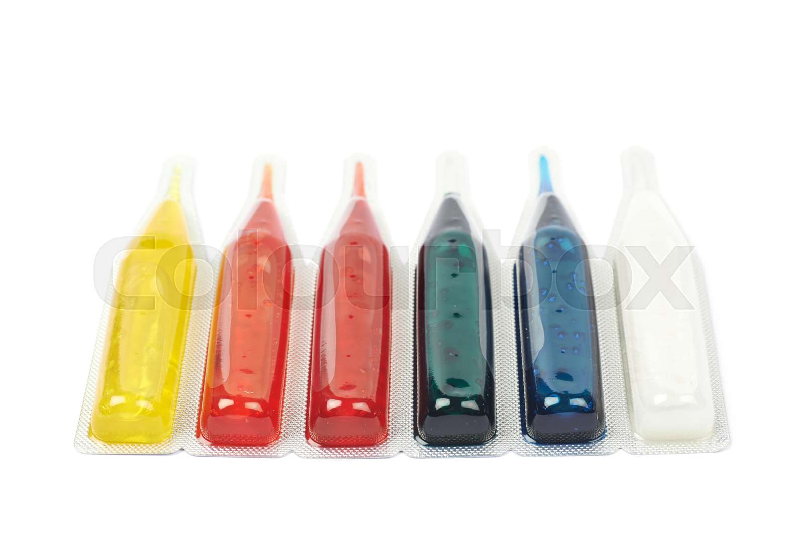 Food dye coloring in a capsule | Stock image | Colourbox