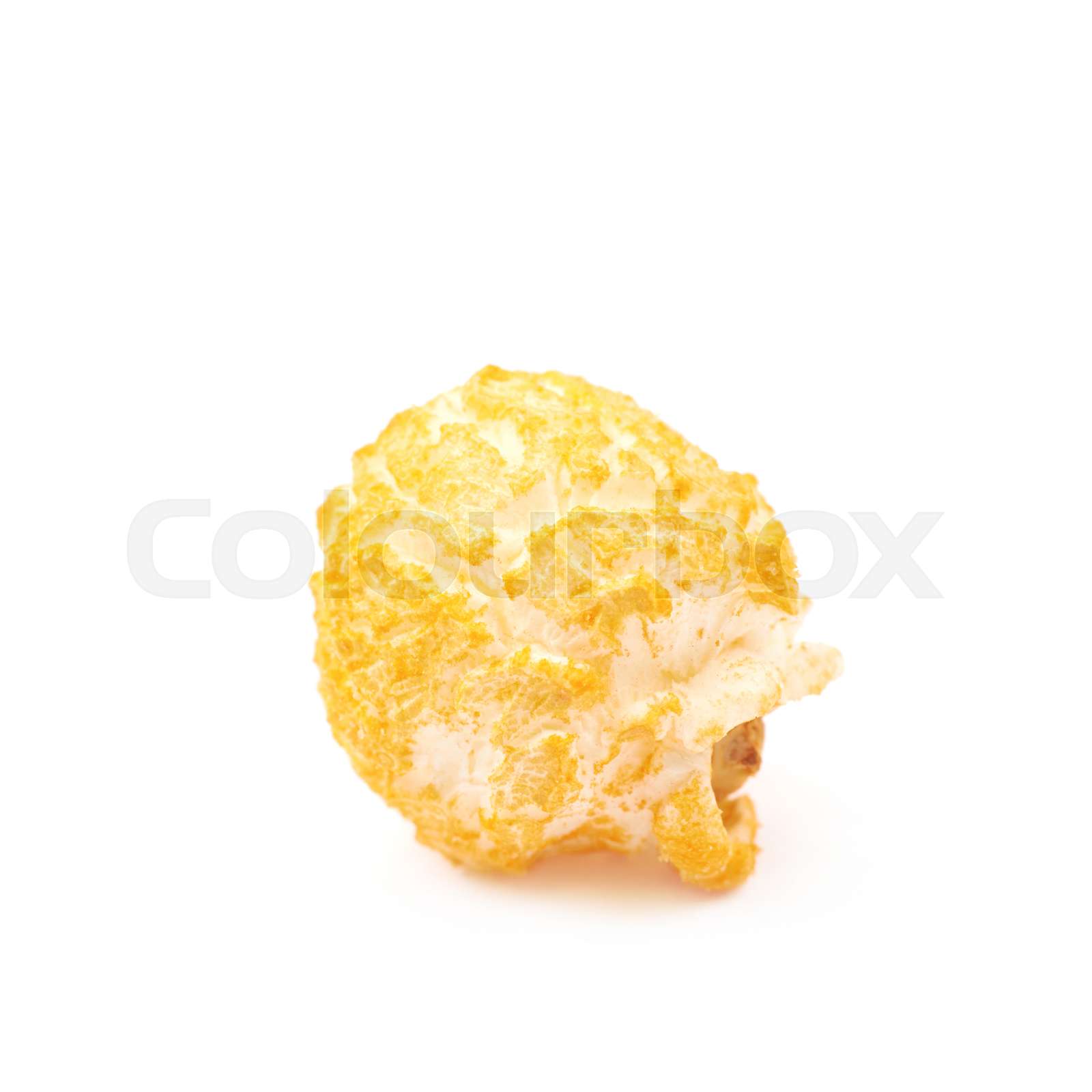 Single popcorn flake isolated | Stock image | Colourbox