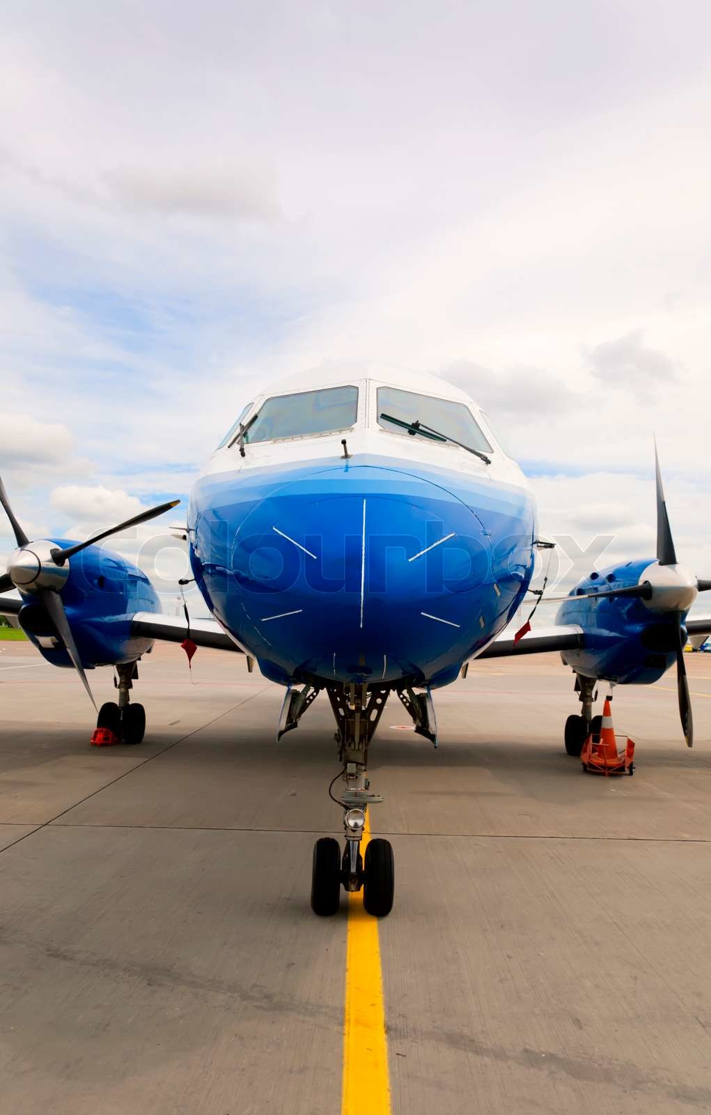 Airplane parked at the airport | Stock image | Colourbox