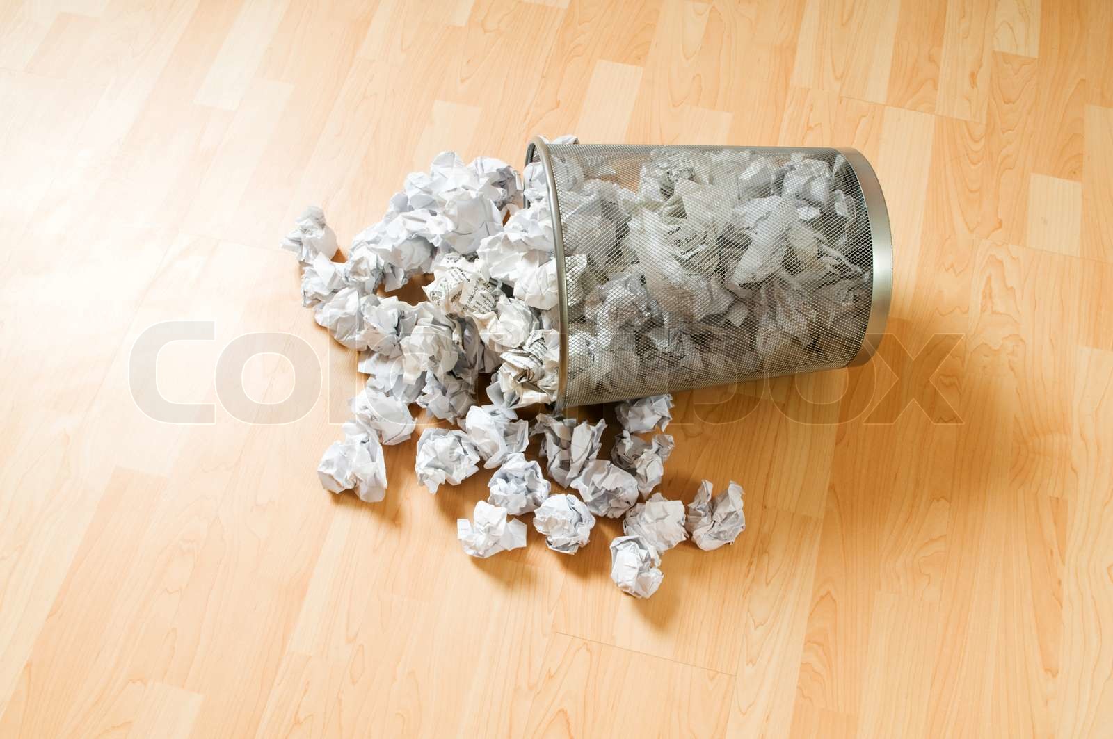 Garbage bin with paper waste isolated on white | Stock image | Colourbox