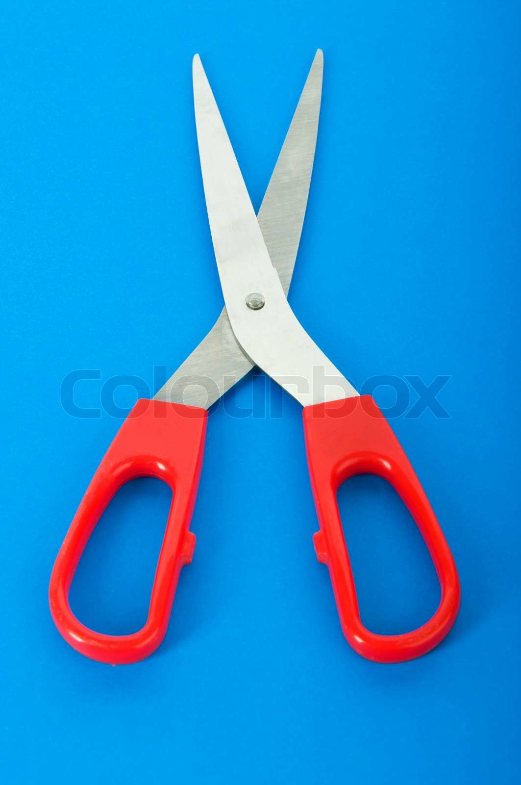 Colorful Schere auf die Farbe Papier Hintergrund | Stock Bild | Colourbox