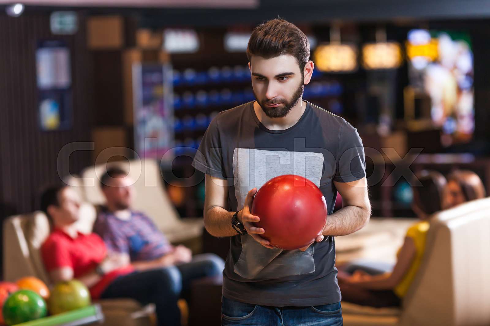 Man with bowling ball | Stock image | Colourbox